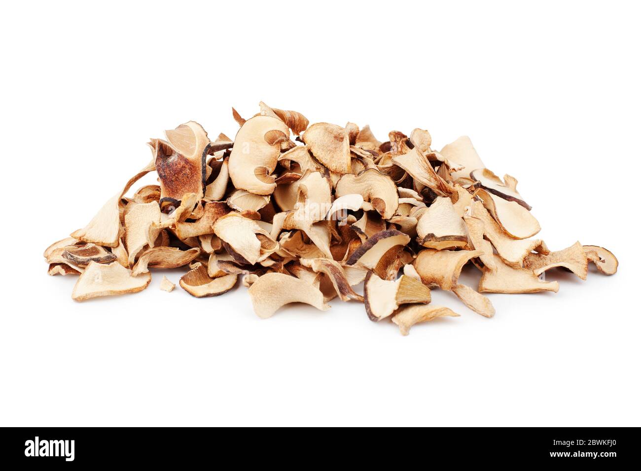 Edible dried mushrooms pile on white background isolated close up, heap ...