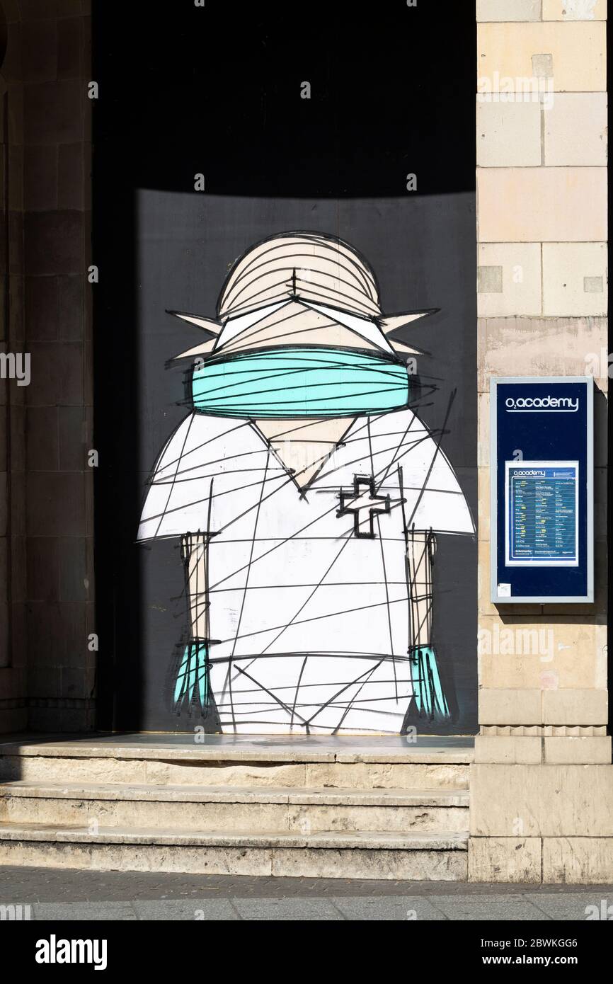 Street art of a medical professional outside the closed O2 Academy ...