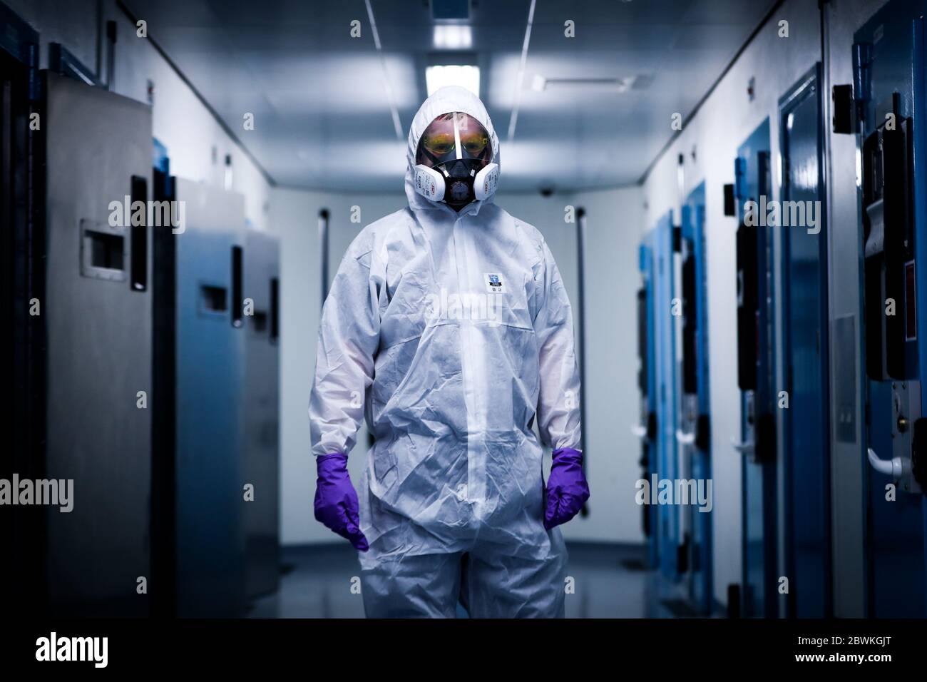 A member of the PSNI Musgrave Street custody team wearing the PPE ...