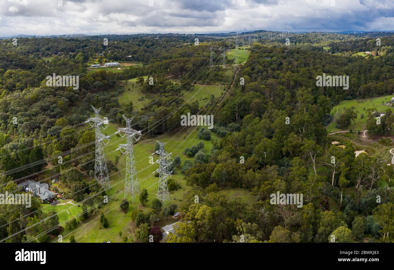 Aerial view of power pylons receding into the distance in the Melbourne ...
