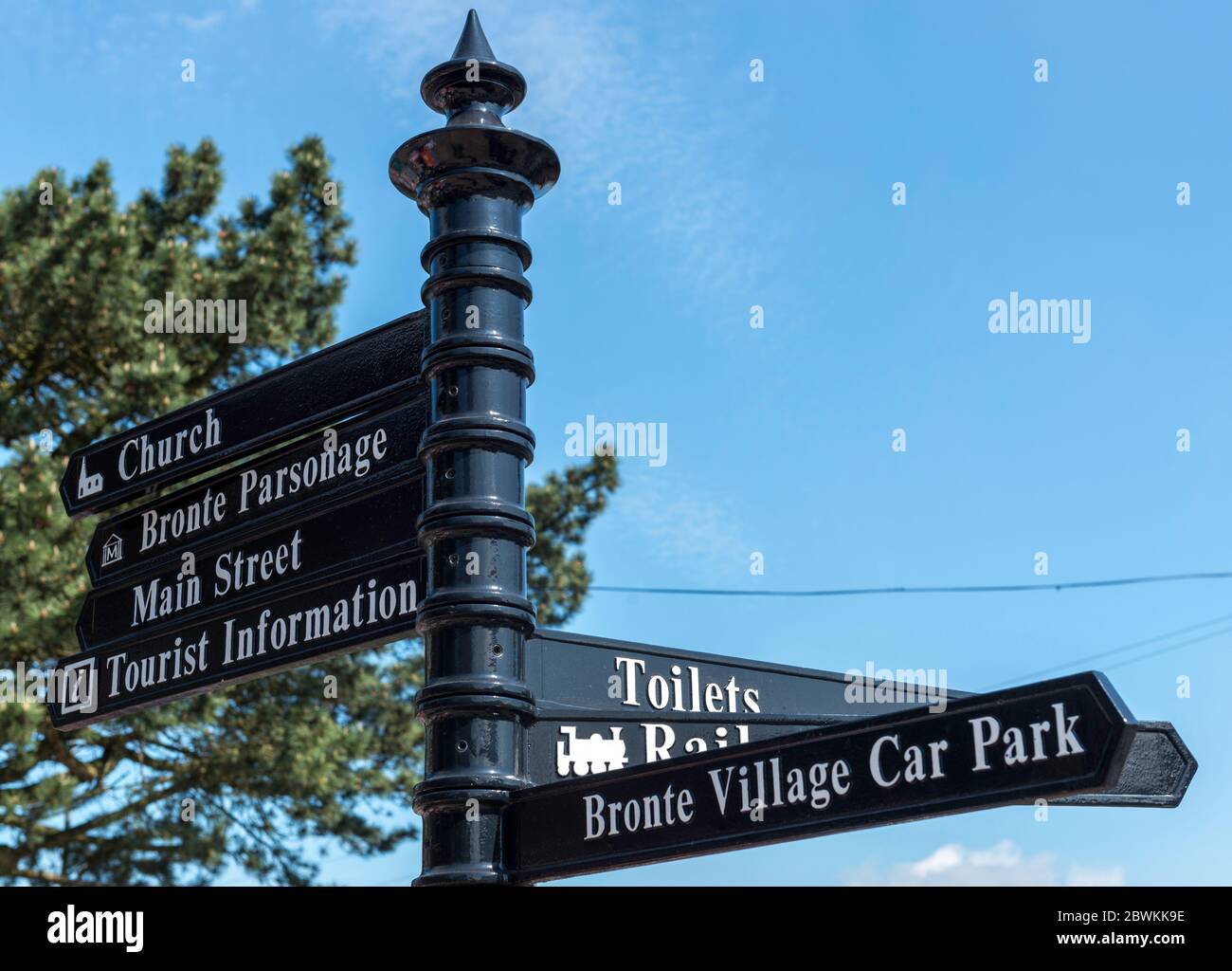 Pedestrian direction sign pointing to attractions around Haworth in ...