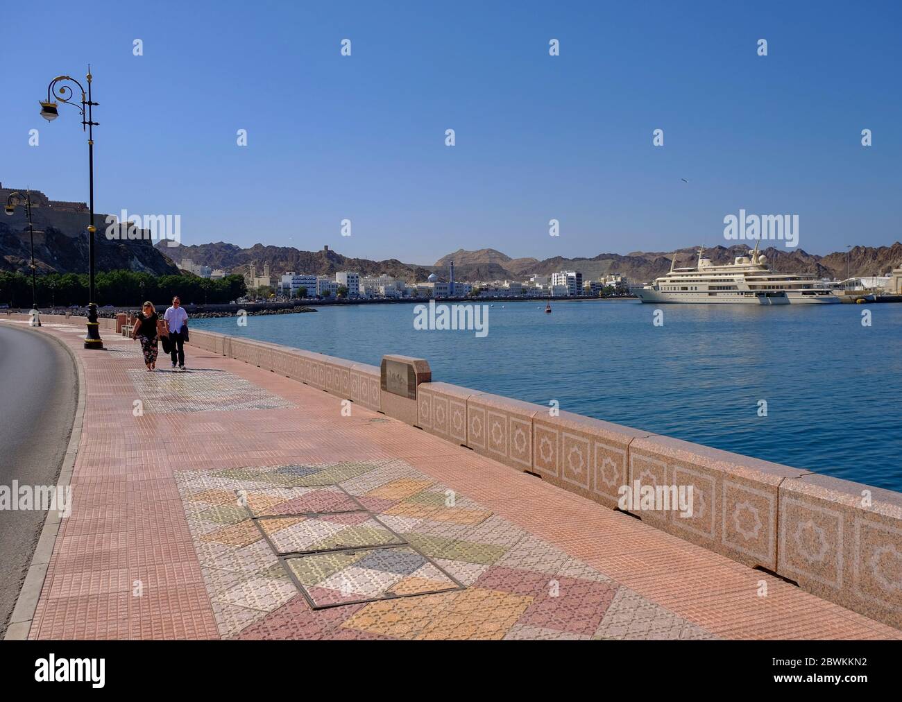 Tourists walking on the Mutrah Corniche in Muscat, Oman Stock Photo - Alamy