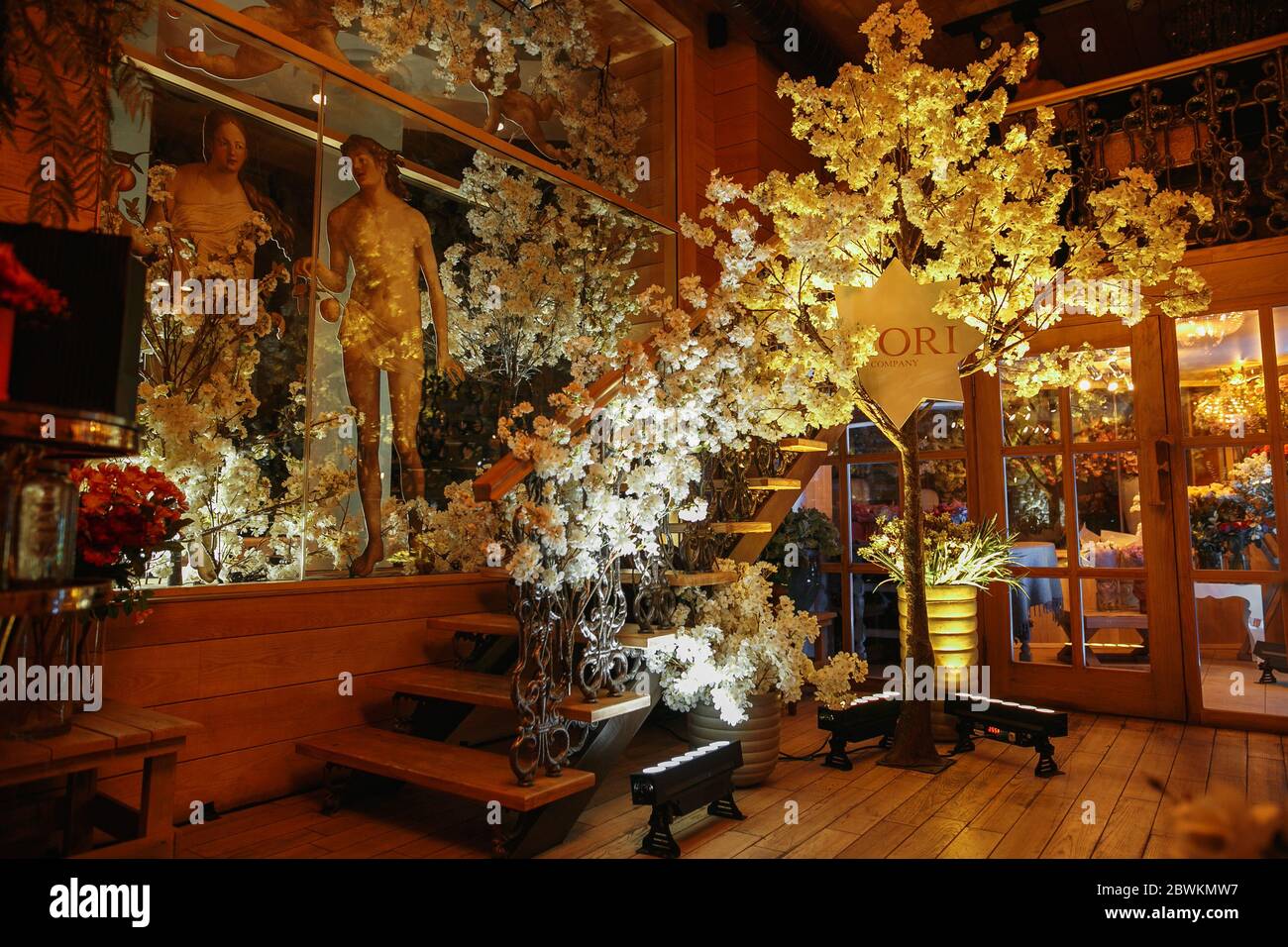 White decorative tree in the restaurant Stock Photo - Alamy