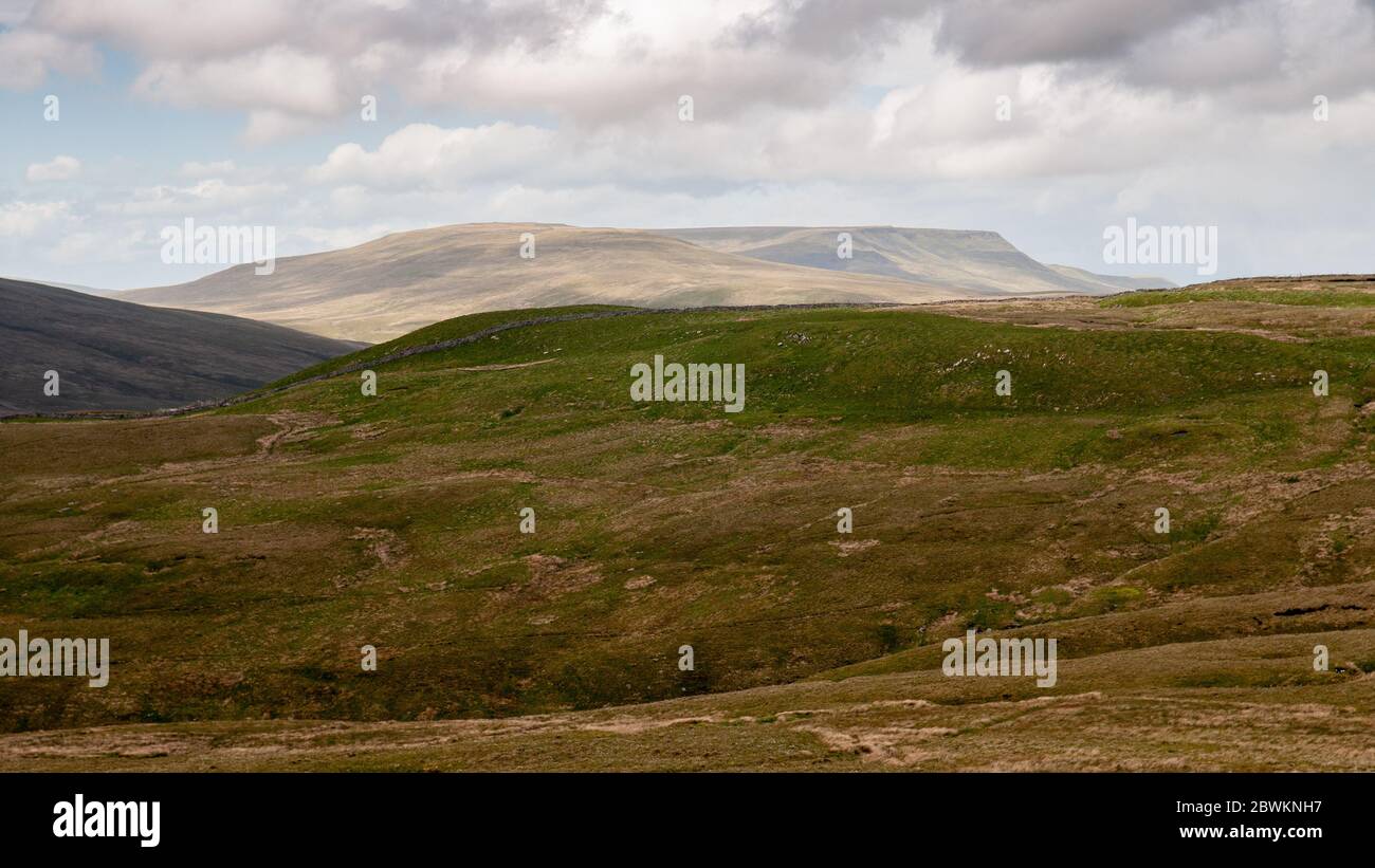 Wild Boar Fell and Swarth Fell hills rise in the distance behind ...
