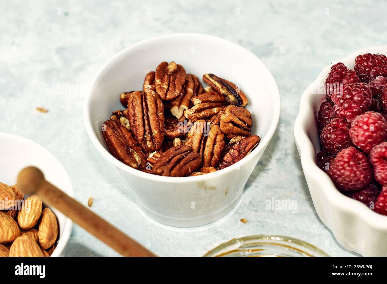 Peeled pecan nuts isolated on white background Stock Photo - Alamy