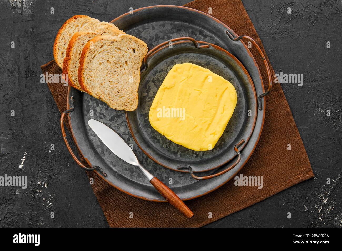 Homemade rustic butter and a spreading knife Stock Photo - Alamy