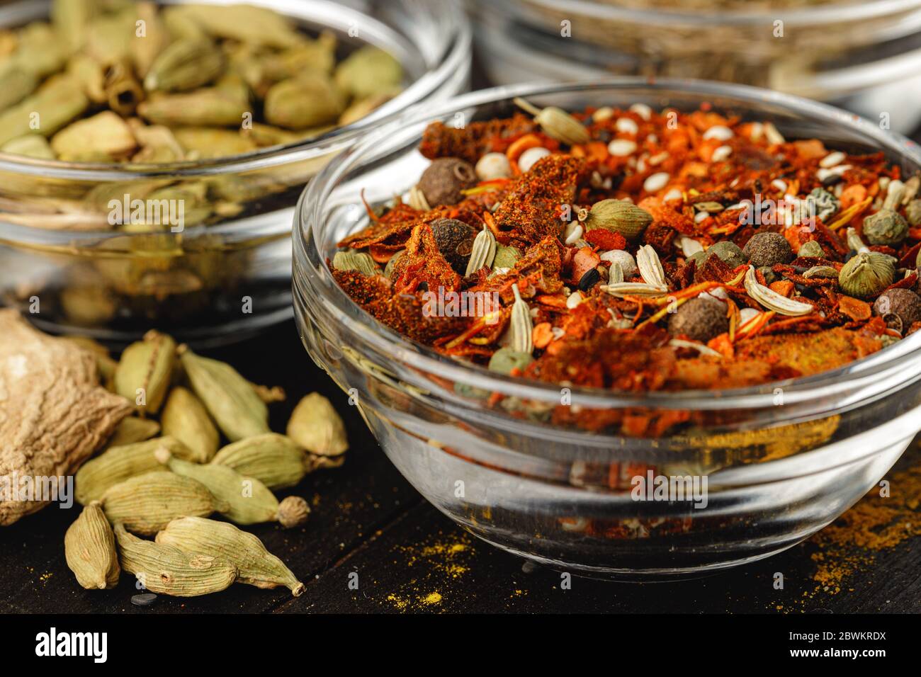 Green spice in glass bowl close up on kitchen table Stock Photo - Alamy