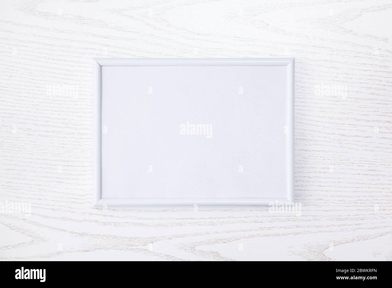 Blank picture frame on wall wallpaper hi-res stock photography and ...