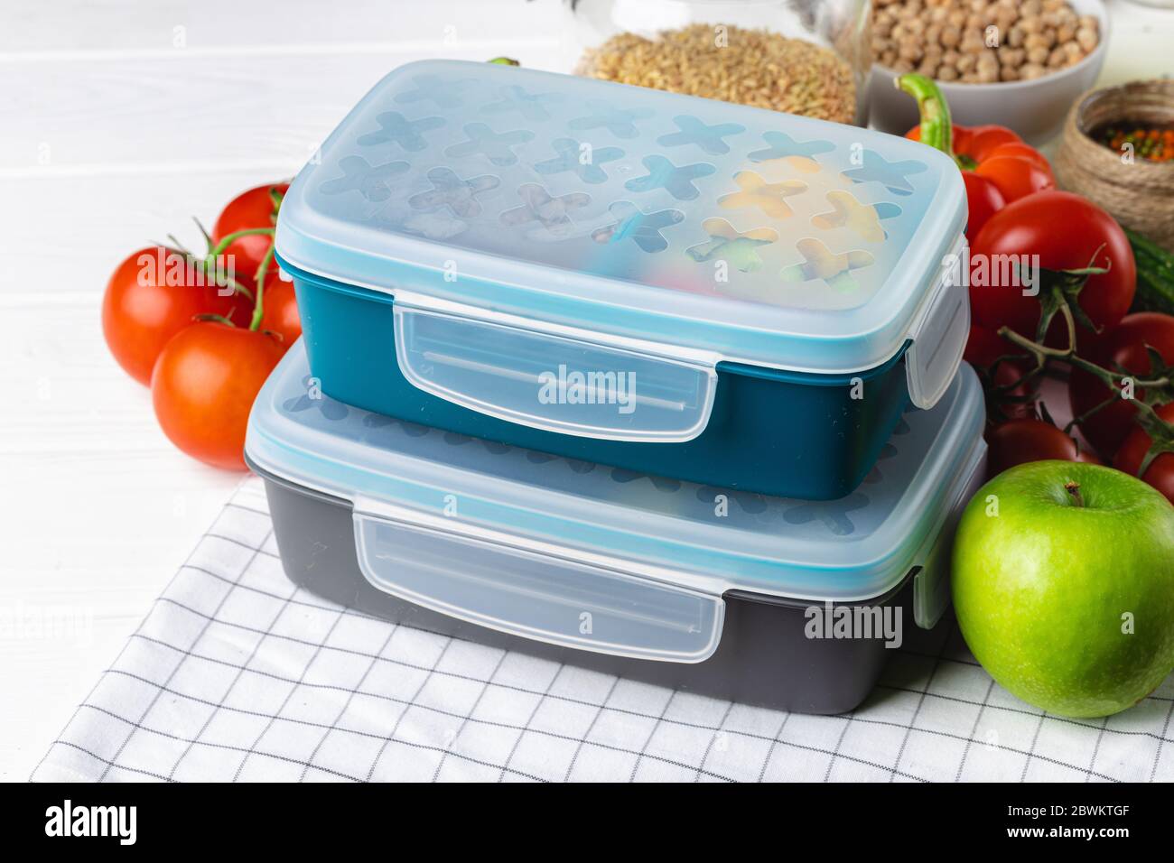 Closed plastic lunch box on kitchen table Stock Photo - Alamy