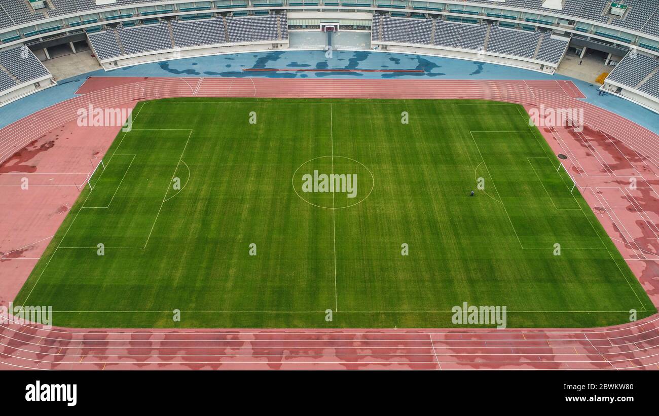 Aerial view of track and field stadium on a cloudy day after rain Stock ...