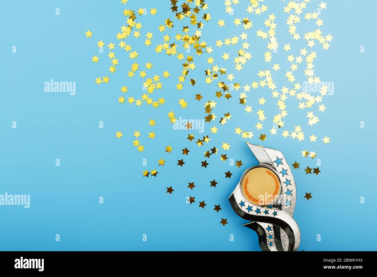 Superprize of gold with fireworks of stars on a blue background Stock ...