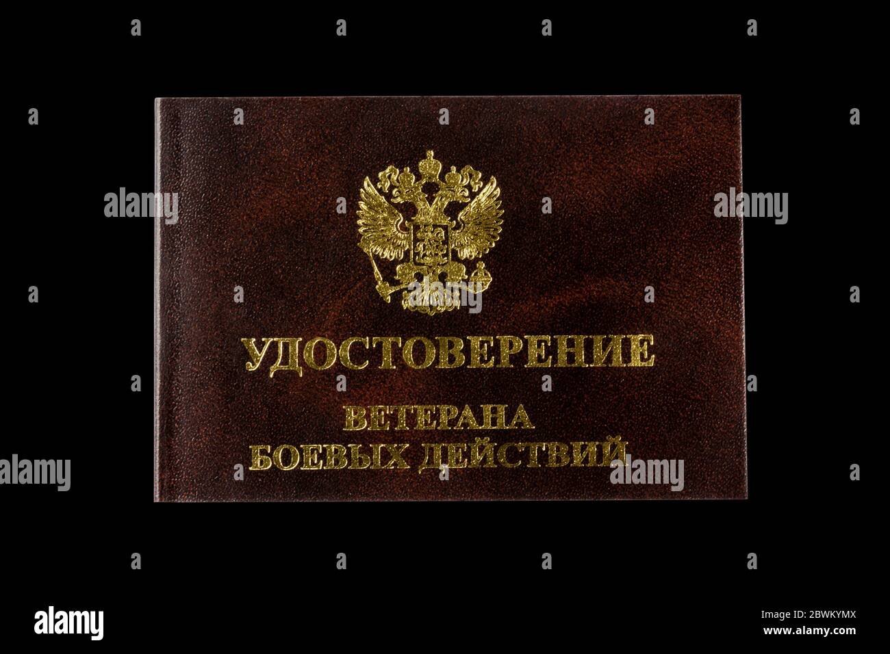 Russian document ID card veteran isolated on black background, top view ...