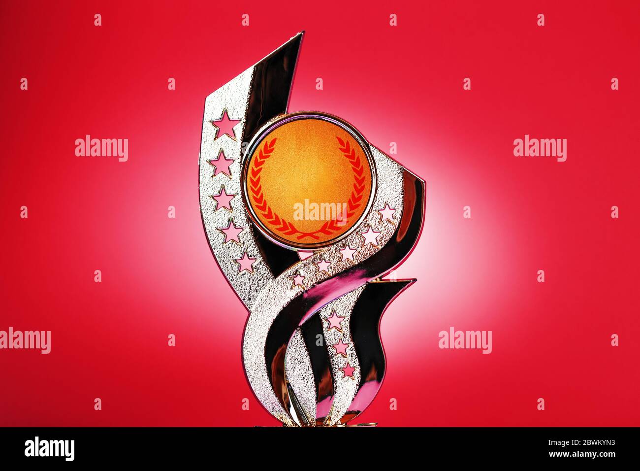 Gold prize on a red background. Super prize Stock Photo - Alamy