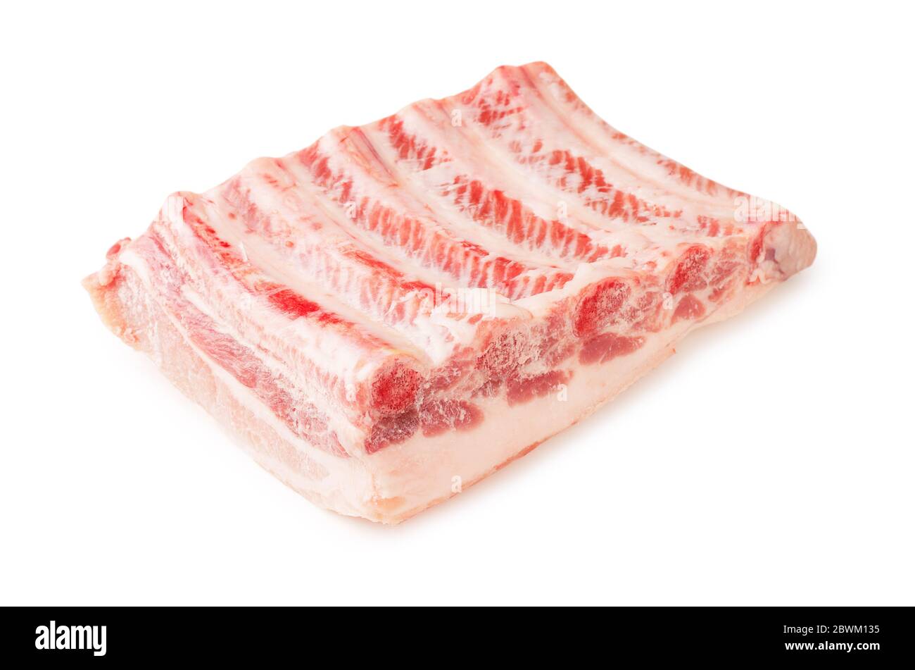 Raw pork ribs isolated on white background Stock Photo - Alamy