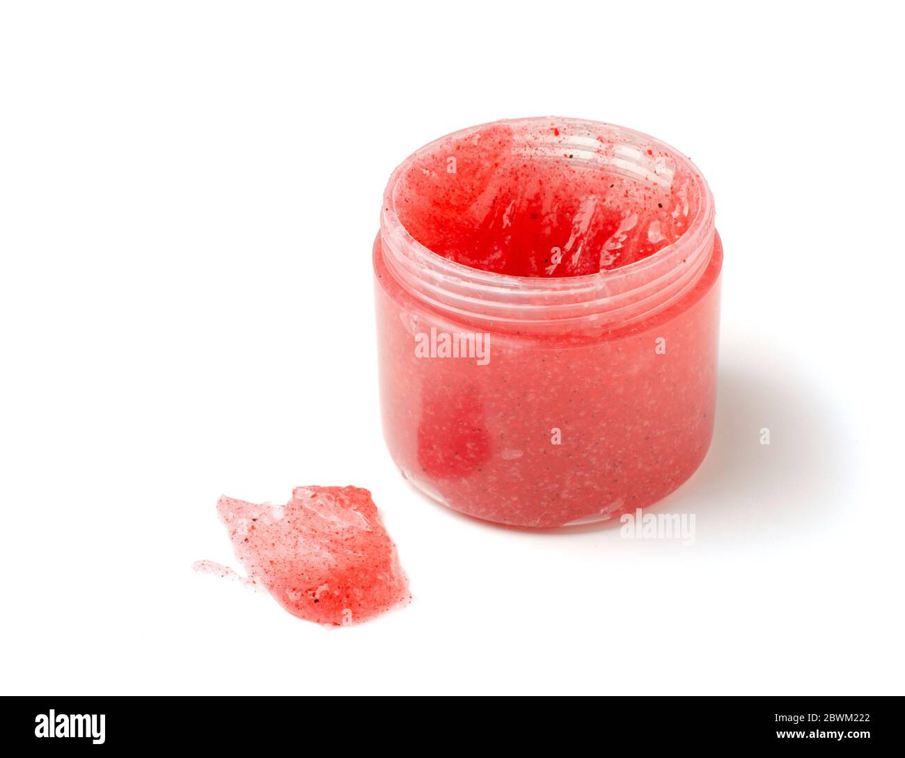 Pink body scrub in jar isolated on a white background Stock Photo - Alamy