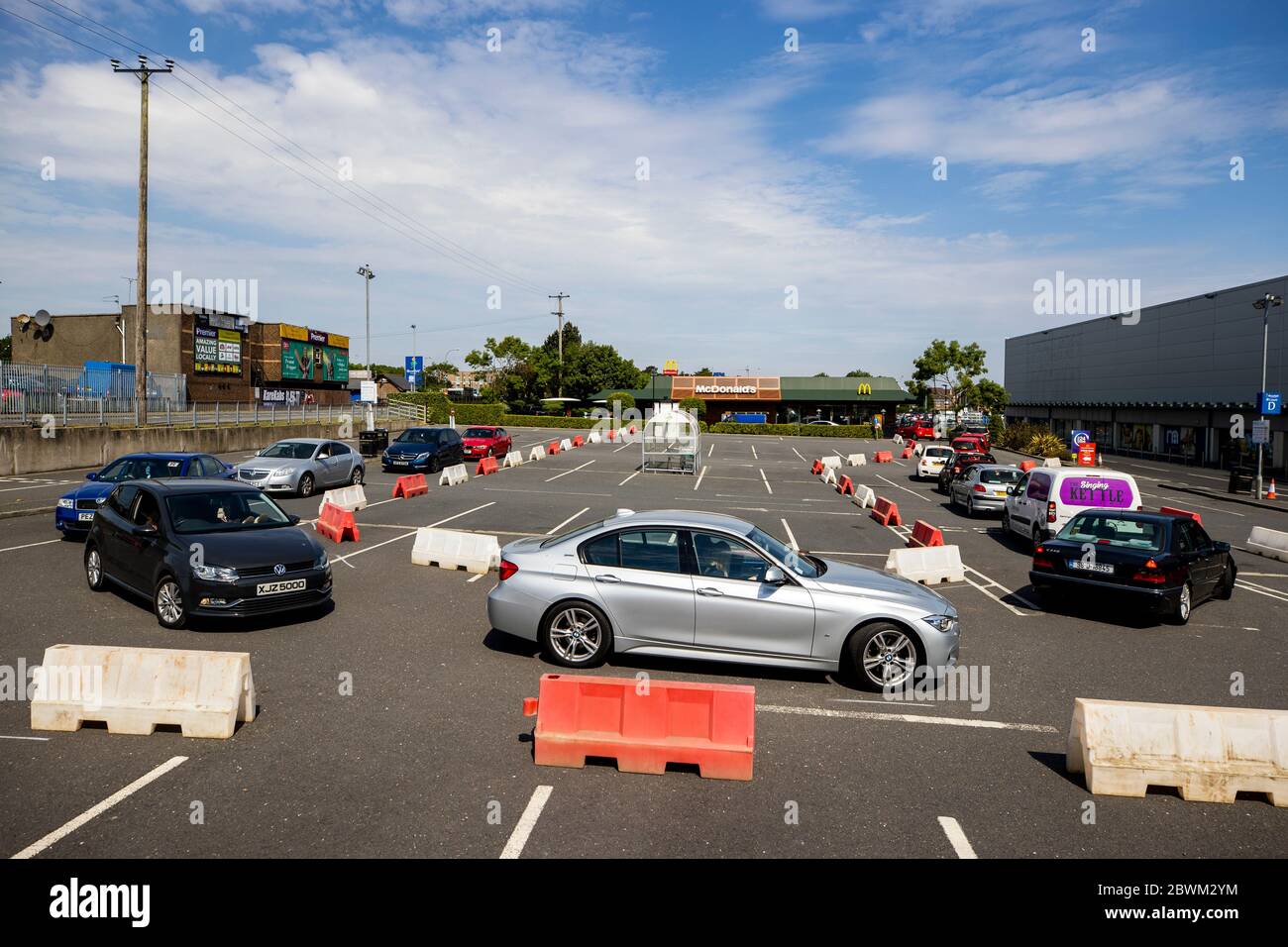 A queue of cars at the reopened McDonald's drive-thru at Bloomfield ...