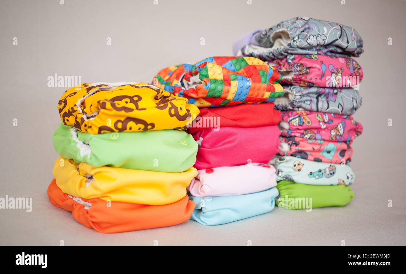 Stack of eco cloth diapers different colors Stock Photo - Alamy