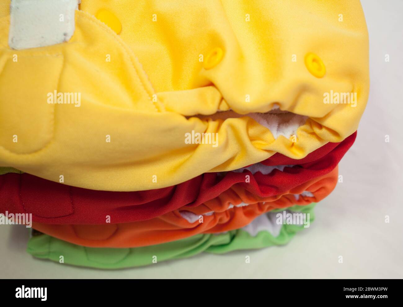 Stack of eco cloth diapers different colors Stock Photo - Alamy