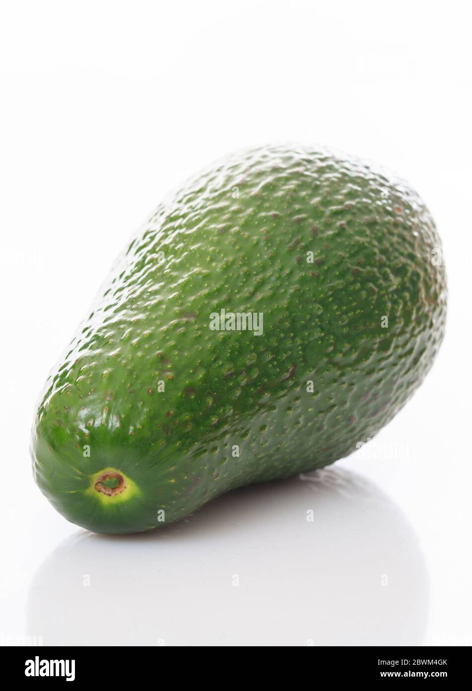 Healthy lifestyle concept. One avocado whole isolated on white ...