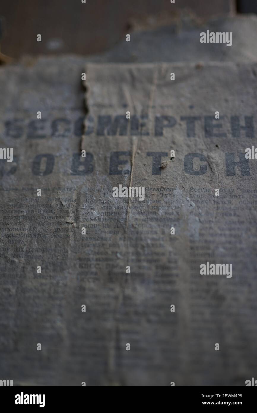 Old dirty torn dusty crumpled unreadable russian newspaper, translation ...