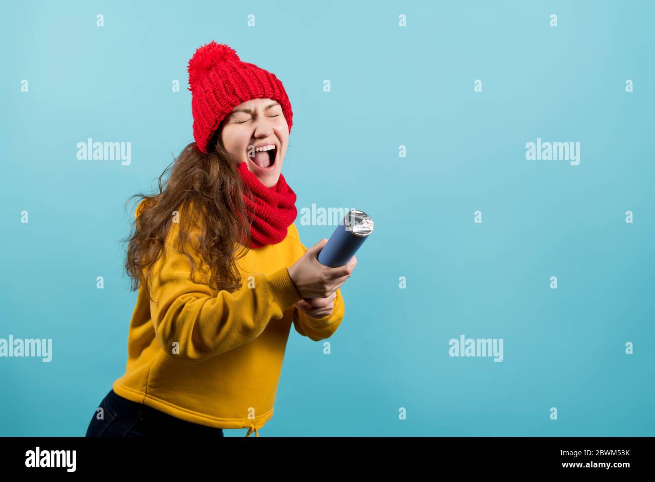 young girl about to blow up a cracker with confetti Stock Photo - Alamy