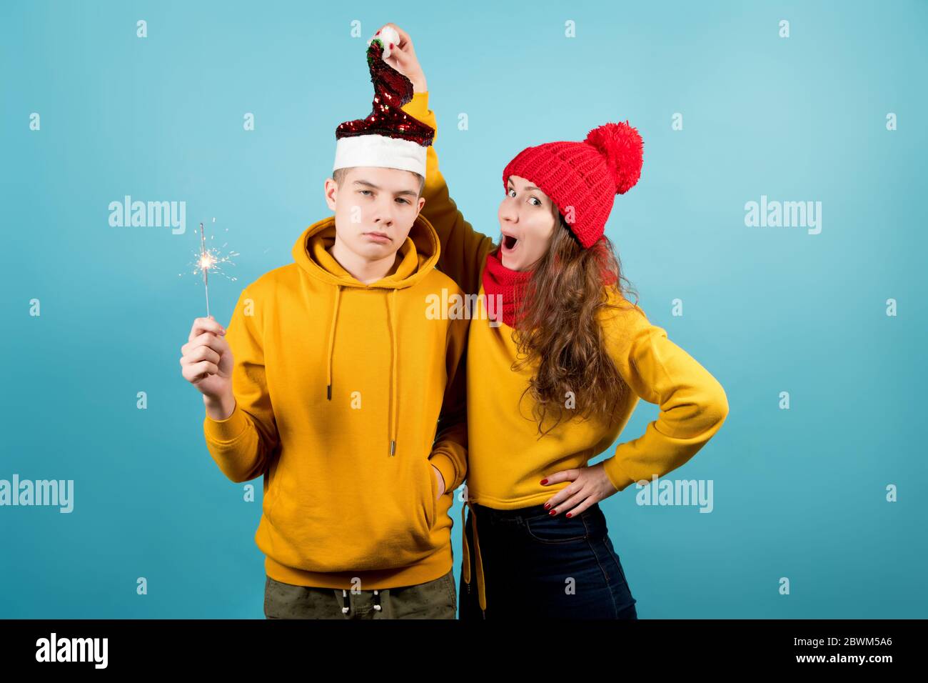 a sad brother with a sparkler in his hand does not express emotions ...