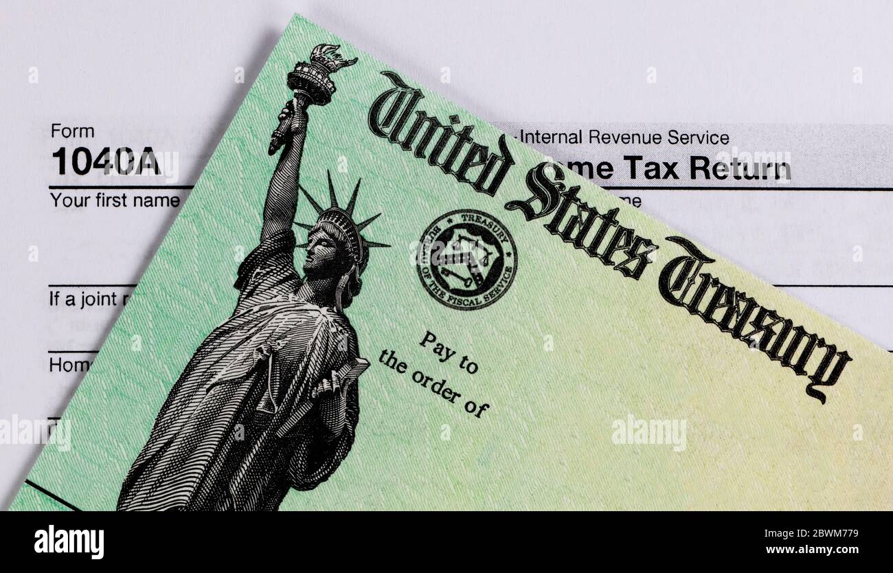 Tax refund check hi-res stock photography and images - Alamy