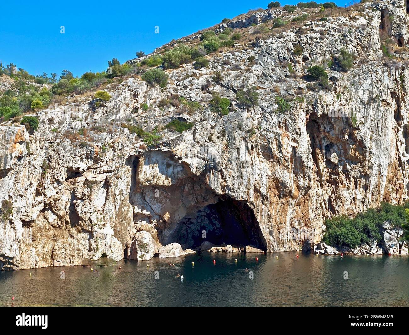 Natural swimming area in Athens in Greece with cliffs Stock Photo - Alamy