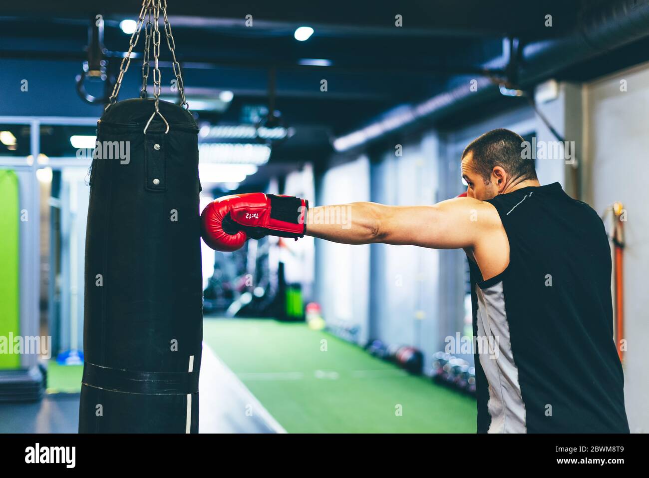 Boxer hitting sack hi-res stock photography and images - Alamy