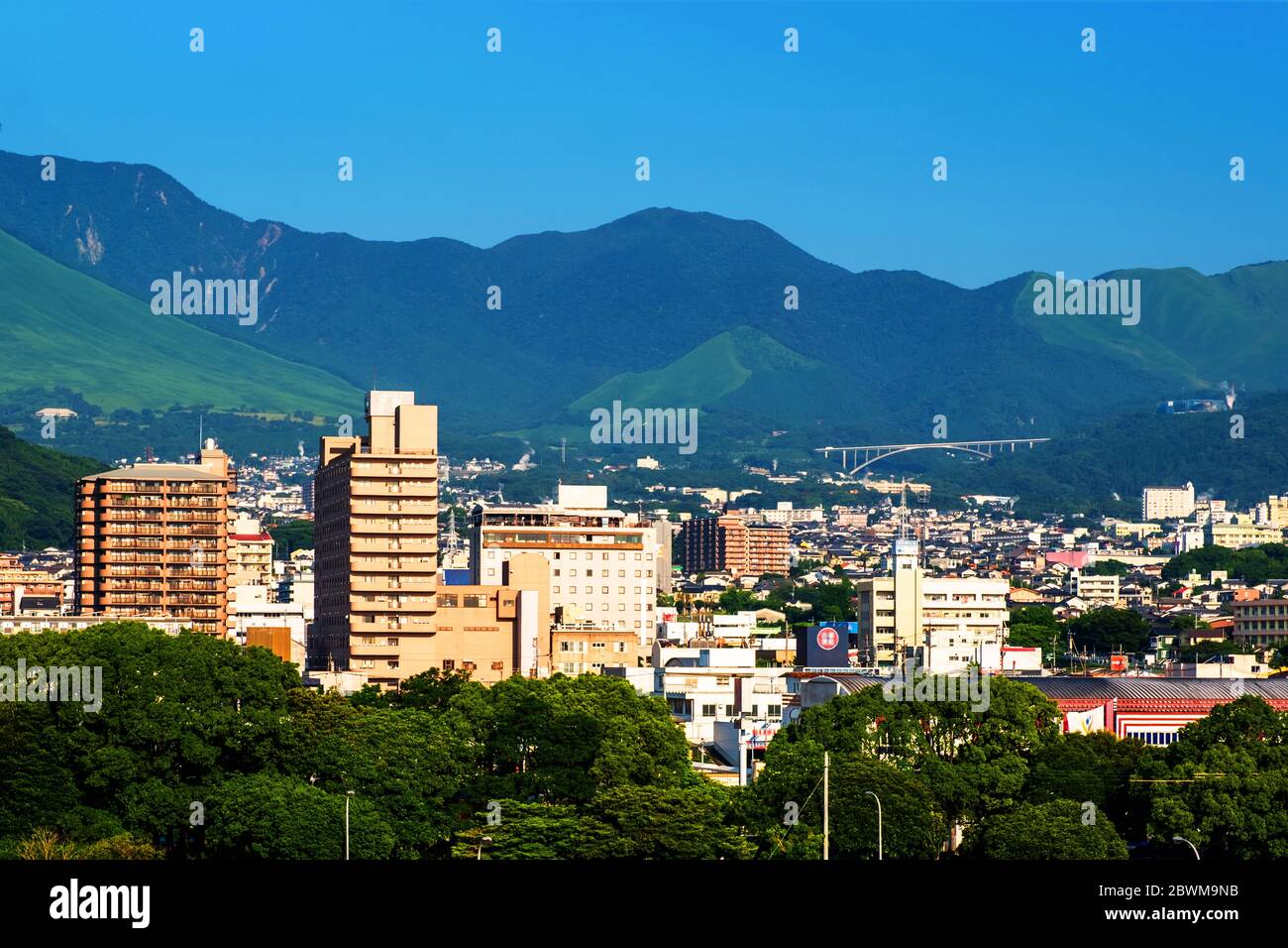 Beppu, Japan. A sunny day in a resort town of Beppu, Japan, with a view ...