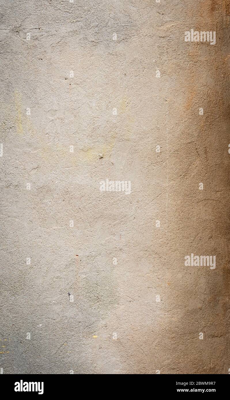 Concrete wall texture with subtle coloration variations in tan, gray ...