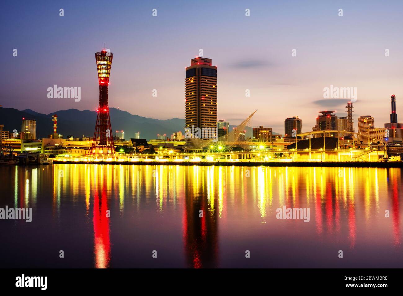 Kobe, Japan. View of sunrise in Kobe, Japan. Cloudless sky with harbor ...