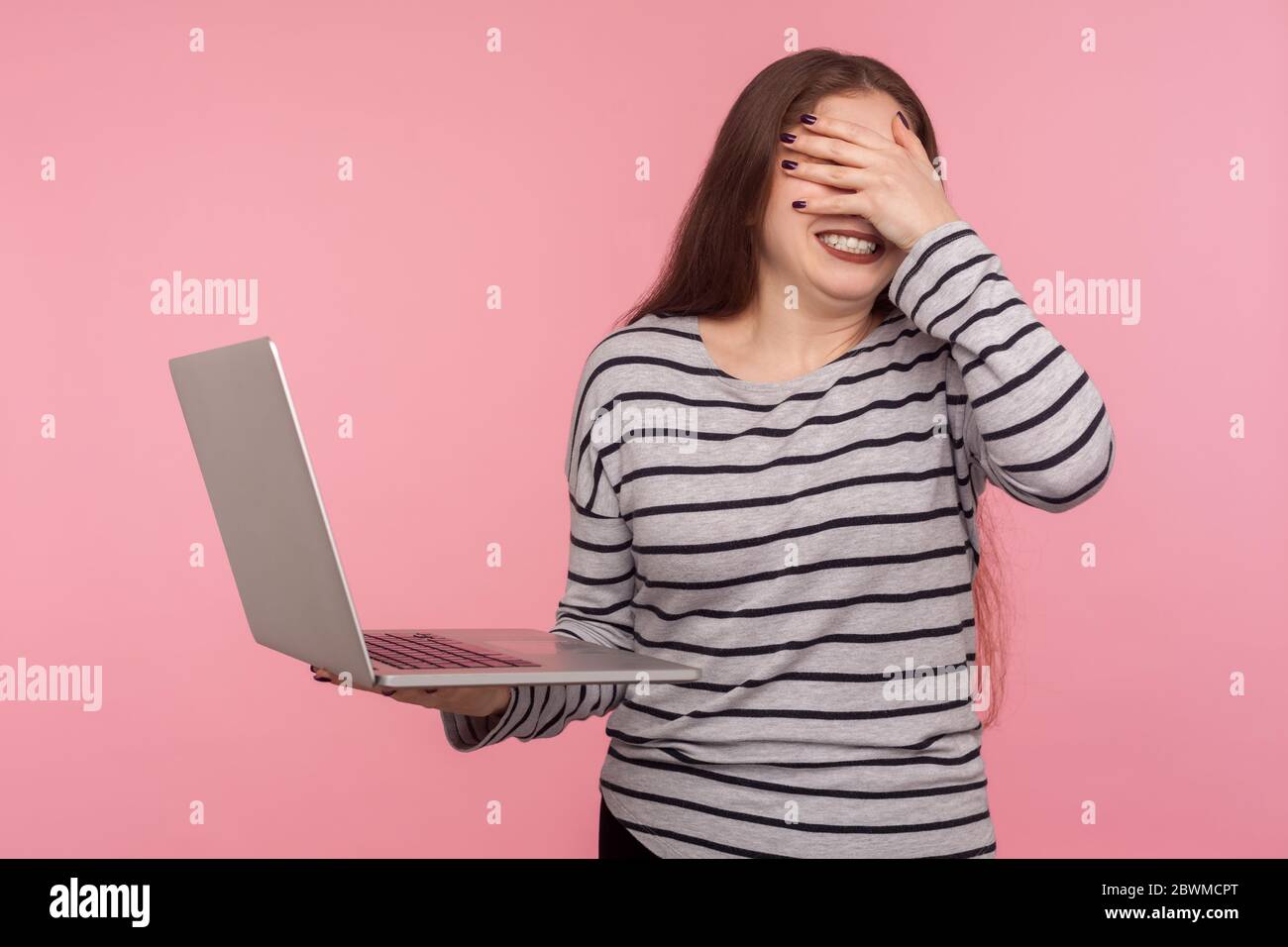 Oops, don't want to look! Portrait of woman covering eyes, feeling ...