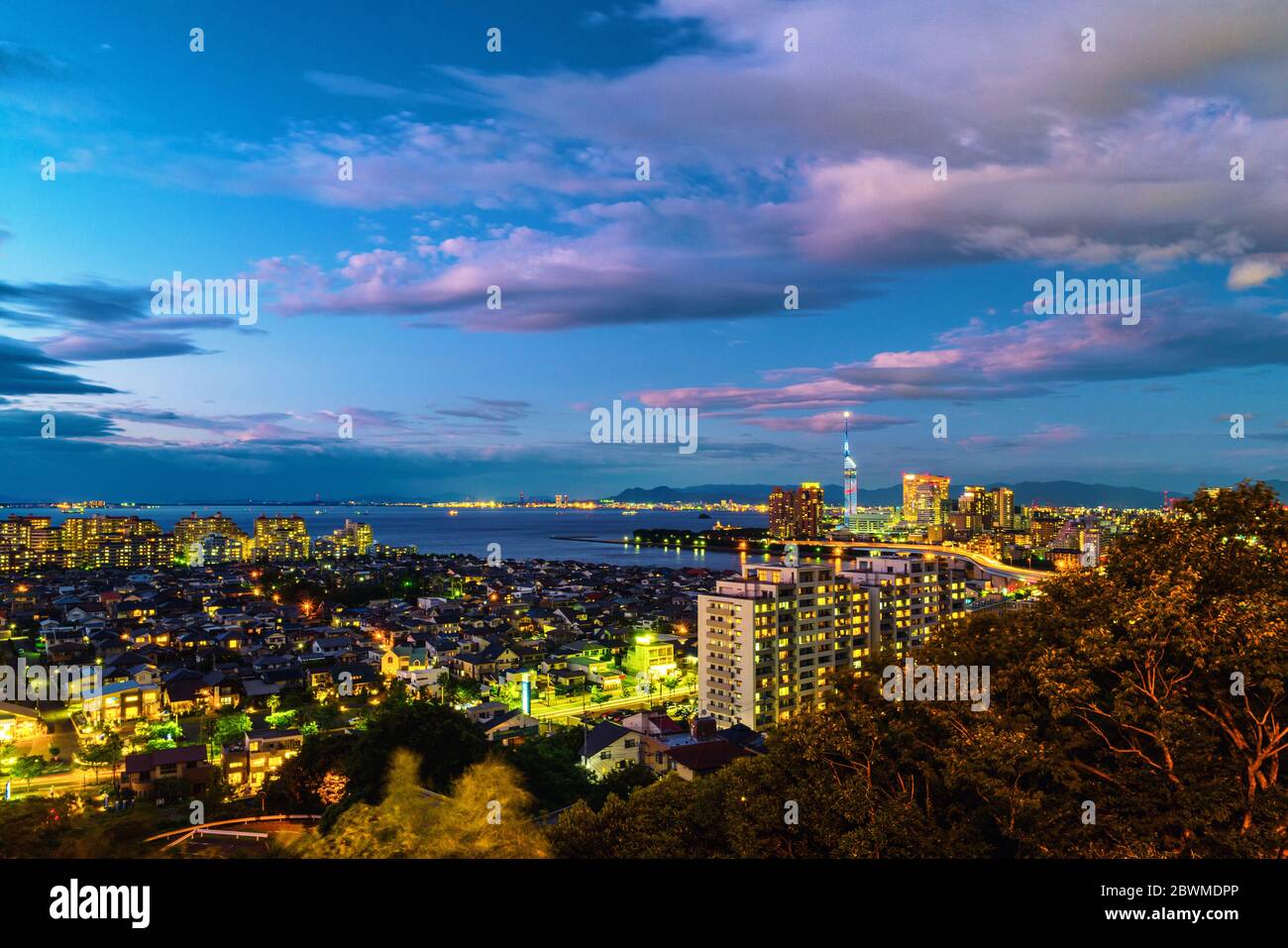 Fukuoka, Japan. A sunset with a view of central Fukuoka, Japan, with ...