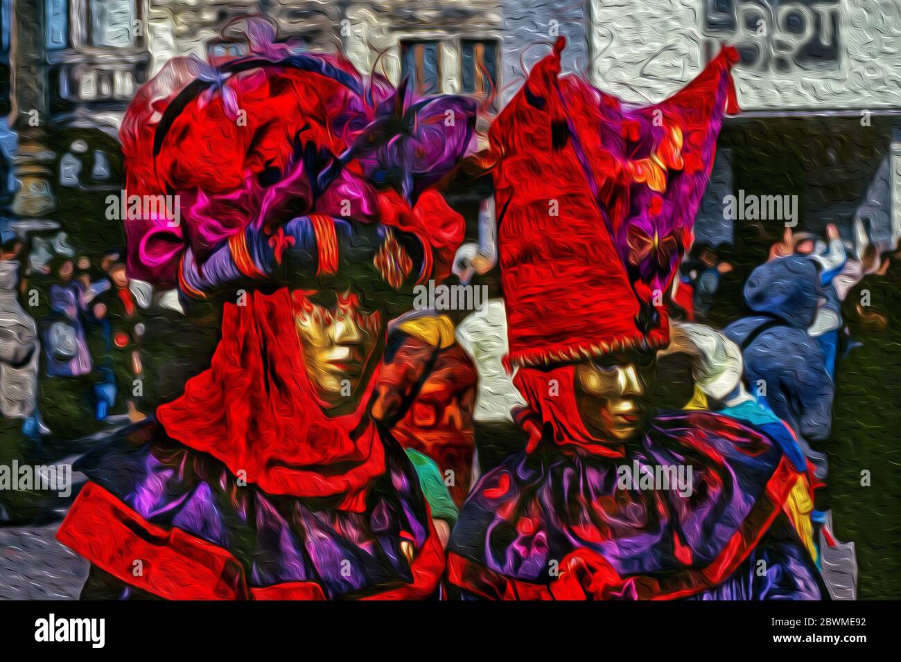 Carnival revelers wearing colorful and sophisticated costumes with ...