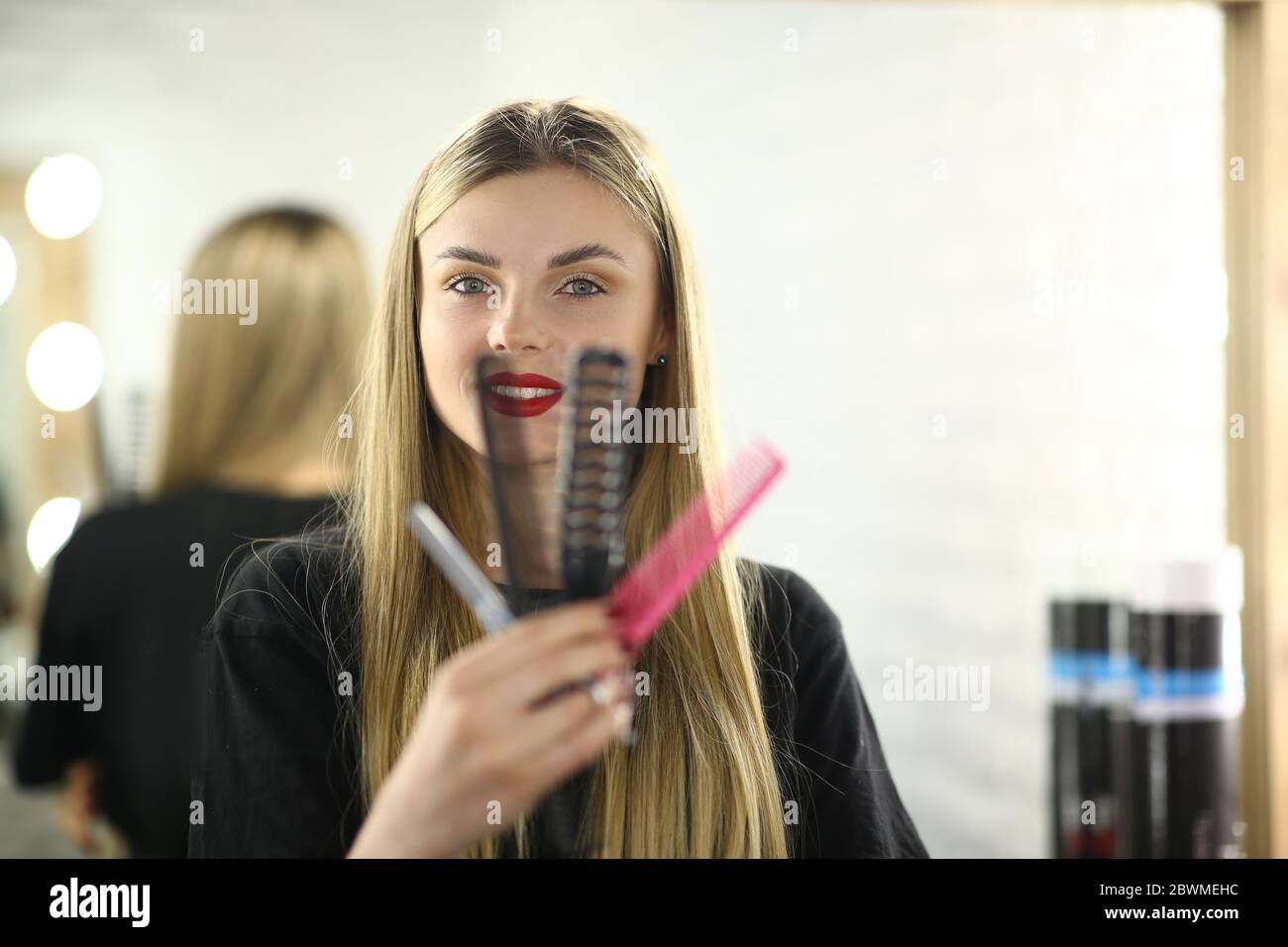 Stylist working model in beauty hi-res stock photography and images - Alamy