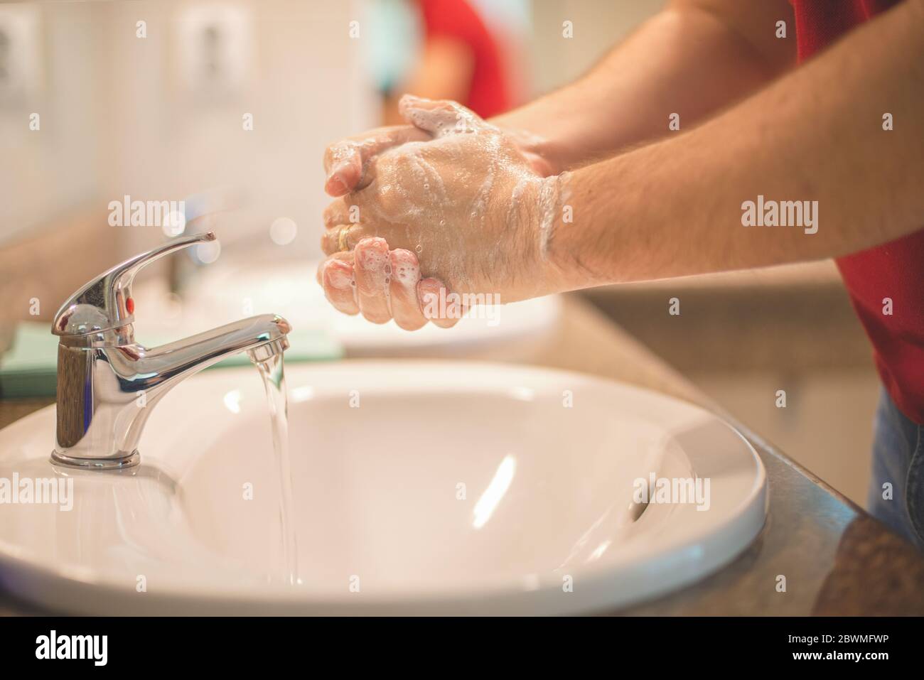 Washing hands rubbing with soap man for corona virus prevention ...