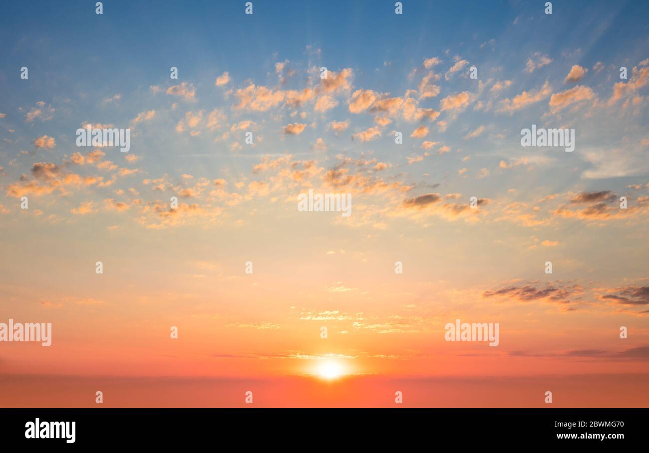 Gentle Natural Sunset Sunrise sky with light clouds and sun, pastel ...