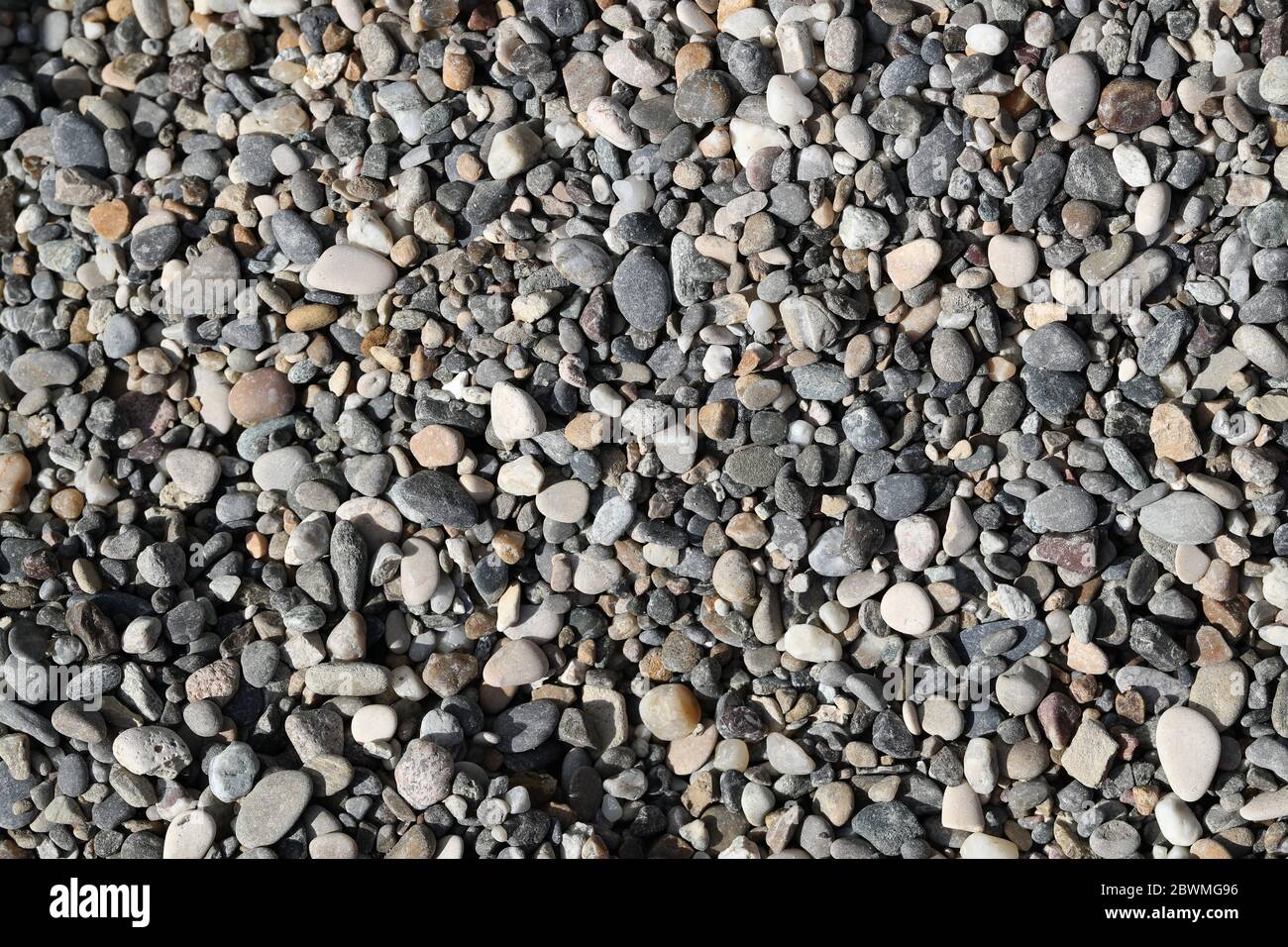 Background of round stones in various sizes Stock Photo - Alamy
