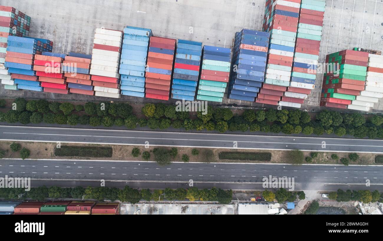 aerial view of loading and moving containers on container yard Stock ...