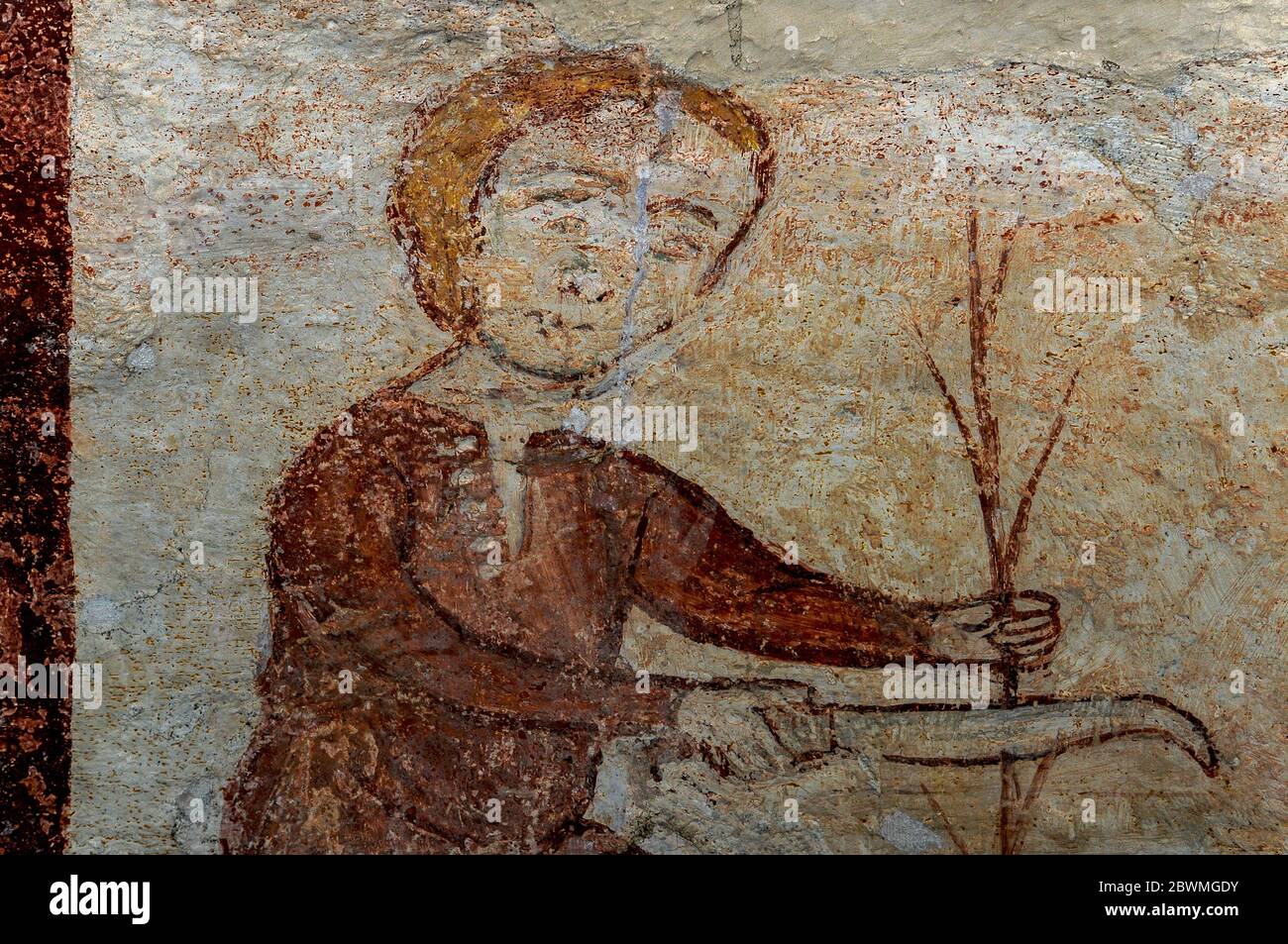 Pruning saplings by hand with a billhook or knife. Close detail of ...