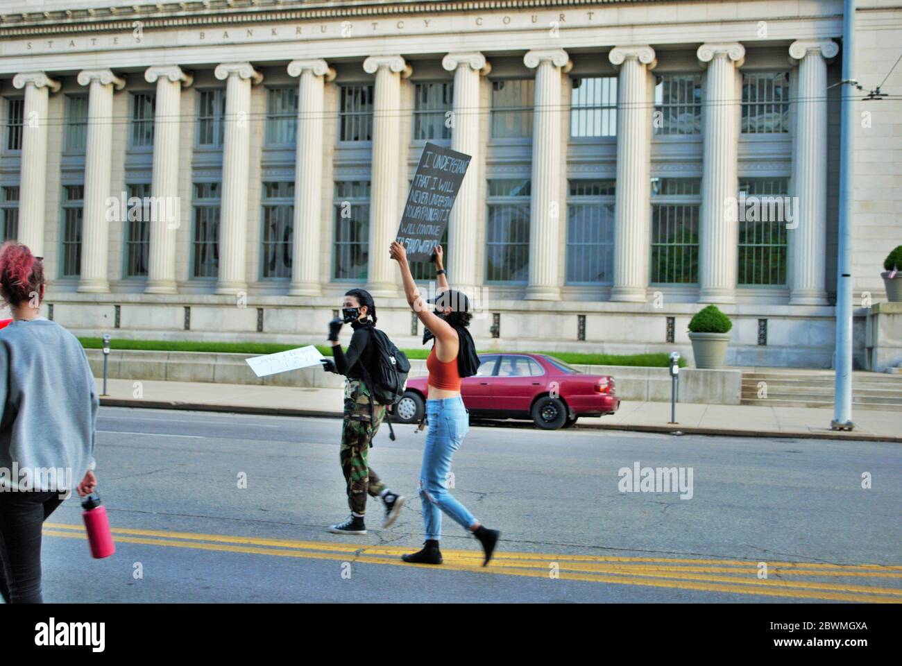 Crowd walking down a street hi-res stock photography and images - Alamy