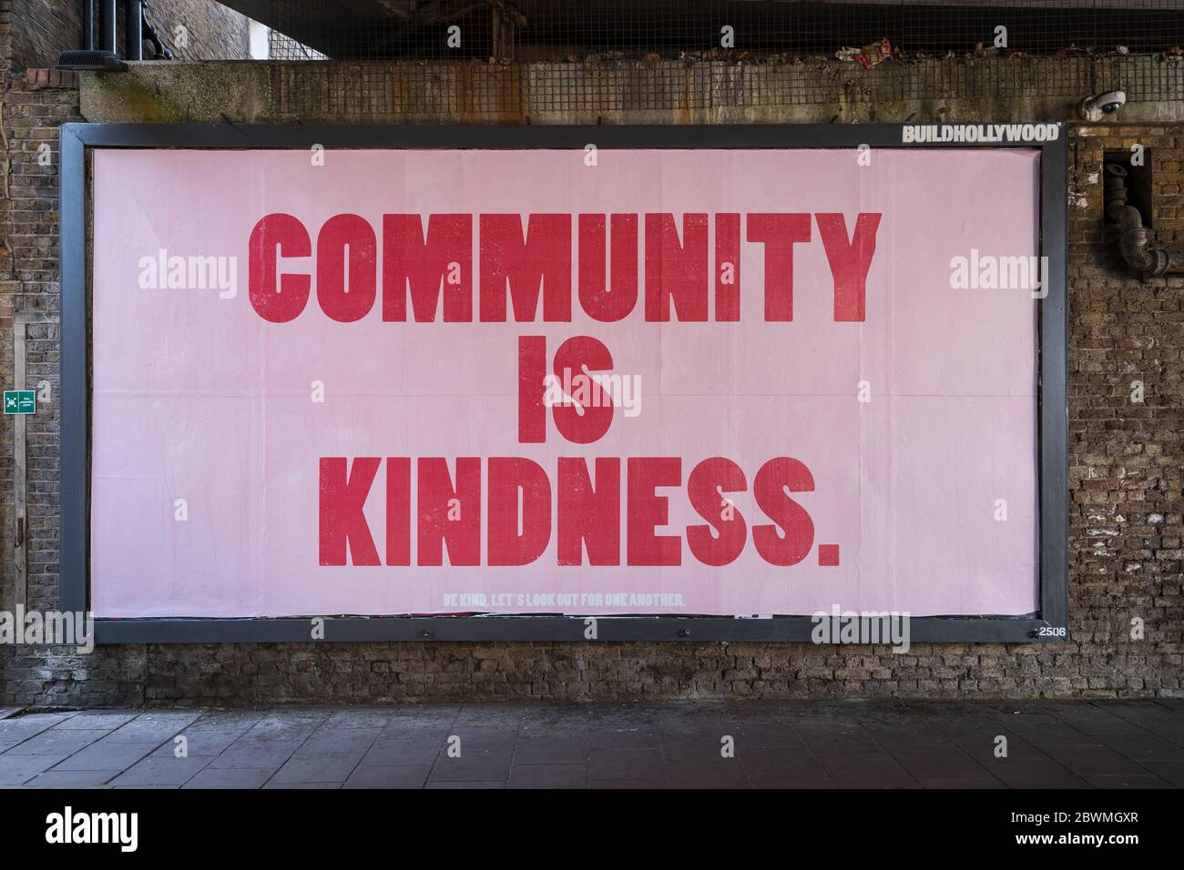 Sign saying Community is Kindness Stock Photo - Alamy