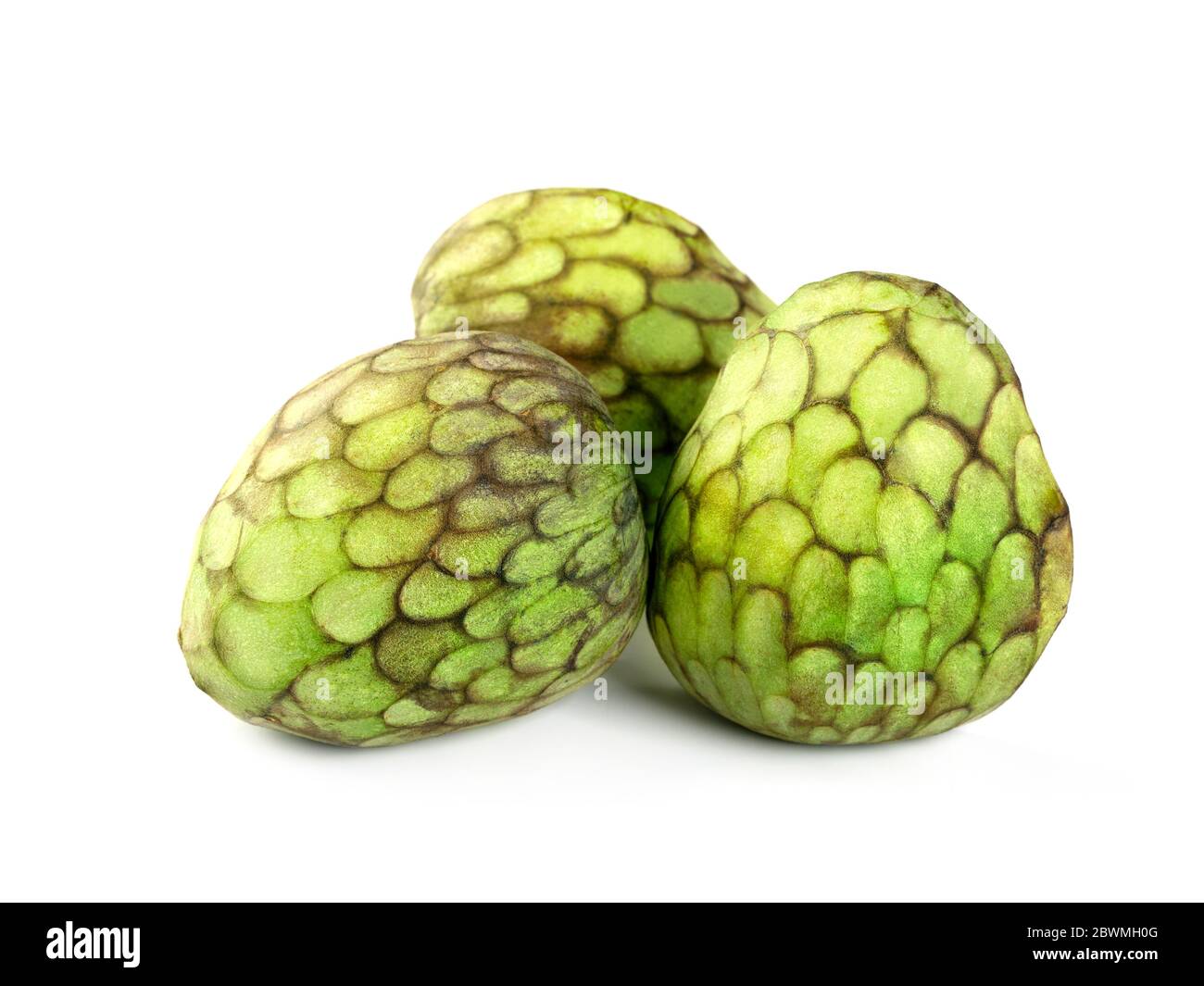 Cherimoya fruits isolated on a white background Stock Photo - Alamy