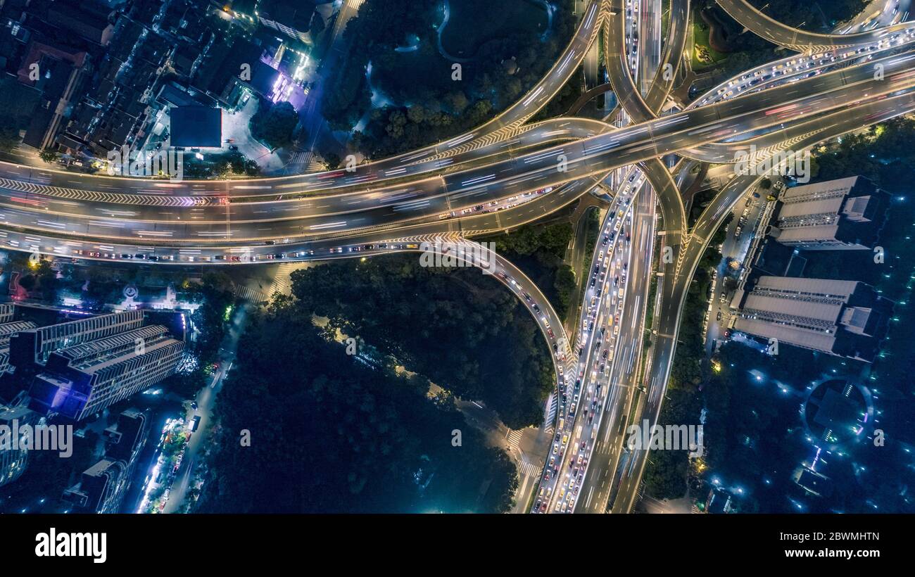 aerial view of highway interchange at night Stock Photo - Alamy