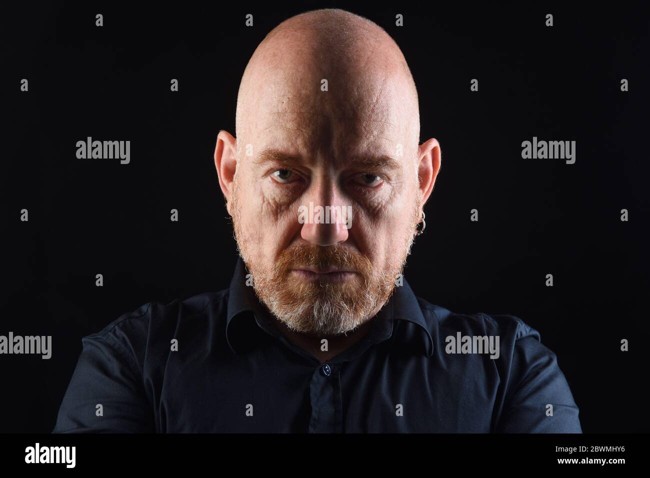 portrait of a serious and staring man Stock Photo - Alamy