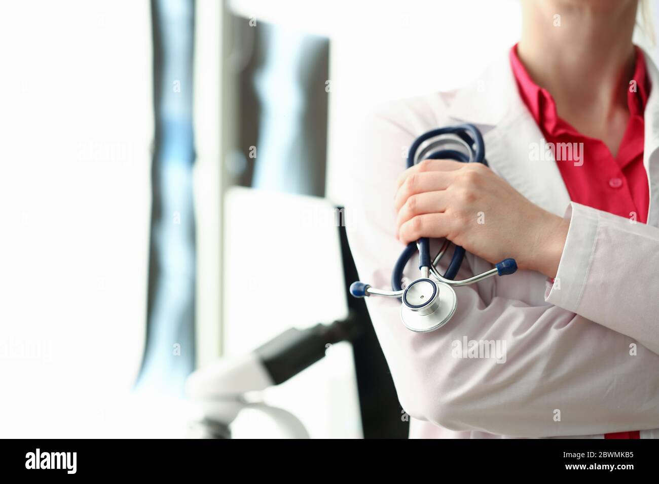 Professional young practitioner working in modern clinic Stock Photo ...