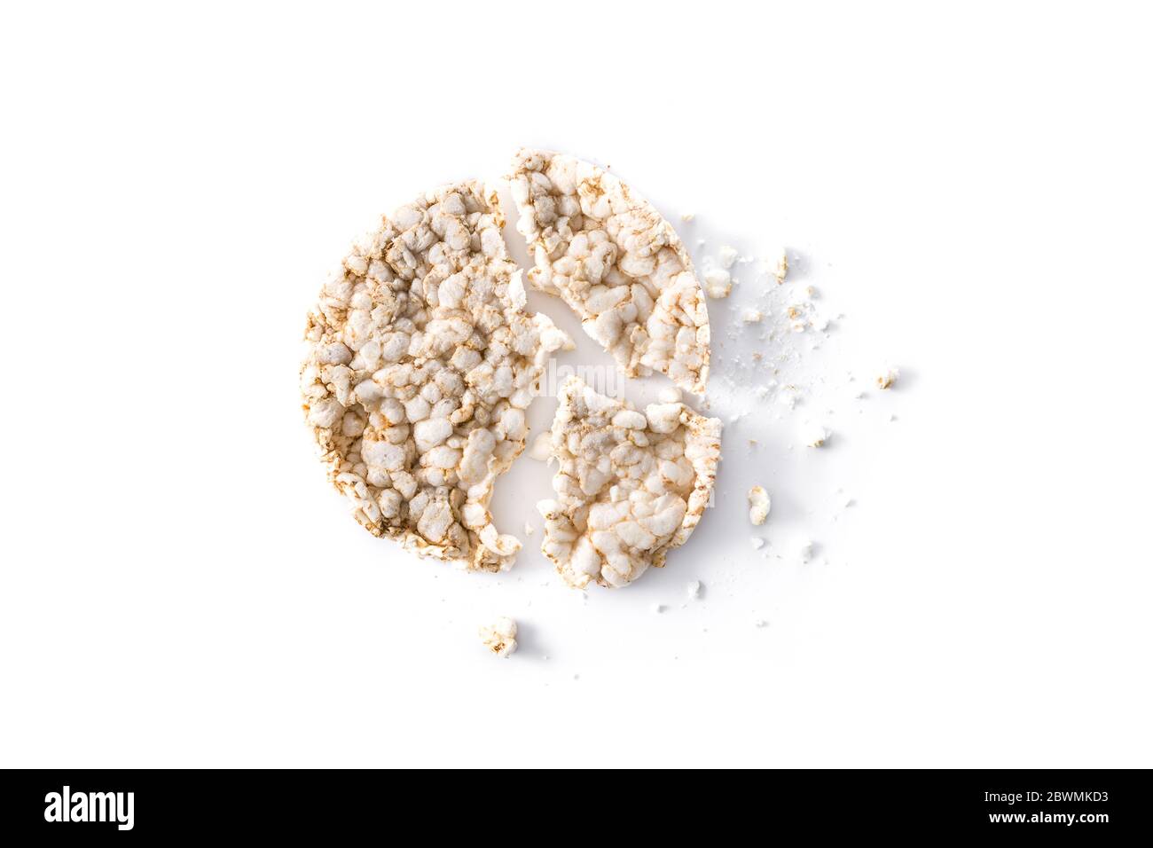 Broken puffed rice cake isolated on white background Stock Photo - Alamy