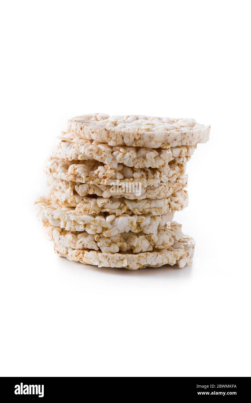 Pile of puffed rice cakes isolated on white background Stock Photo - Alamy