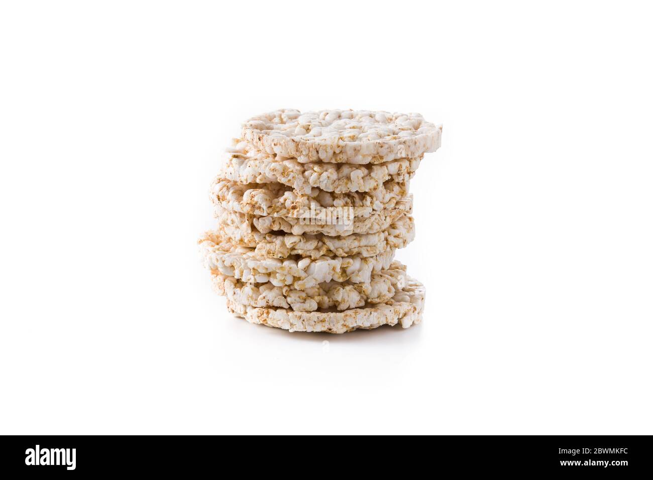 Pile of puffed rice cakes isolated on white background Stock Photo - Alamy